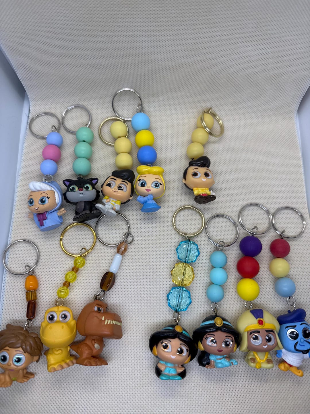 Cinderella/ Good Dinosaur/ Aladdin Doorable Keychains - Etsy