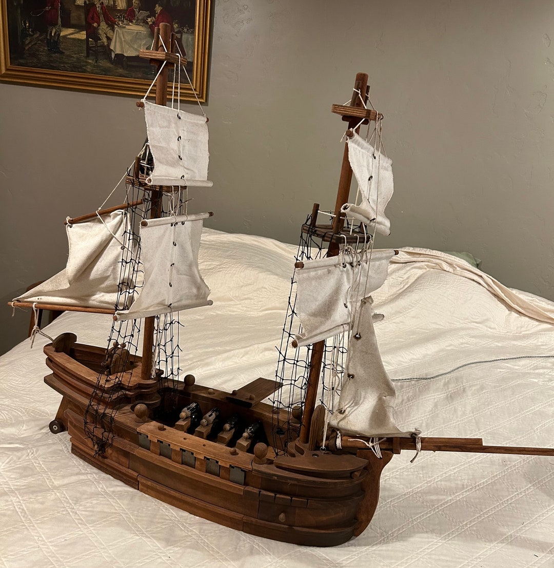 Wooden Model Ship With Four Cannons and Other Pieces Not Necessarily Original to the Ship. See ...