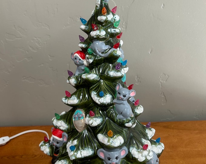 Ceramic Christmas Tree With Plastic Multi Colored Bulbs Which Shine ...