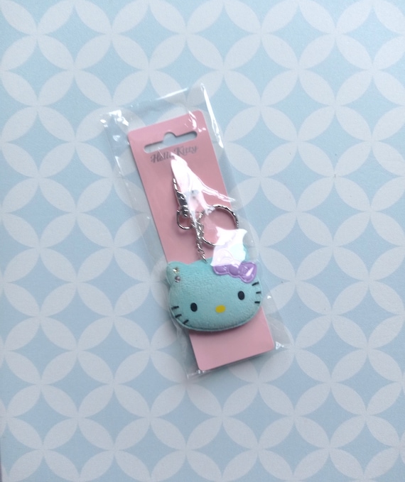 Hello kitty metal key - Gem