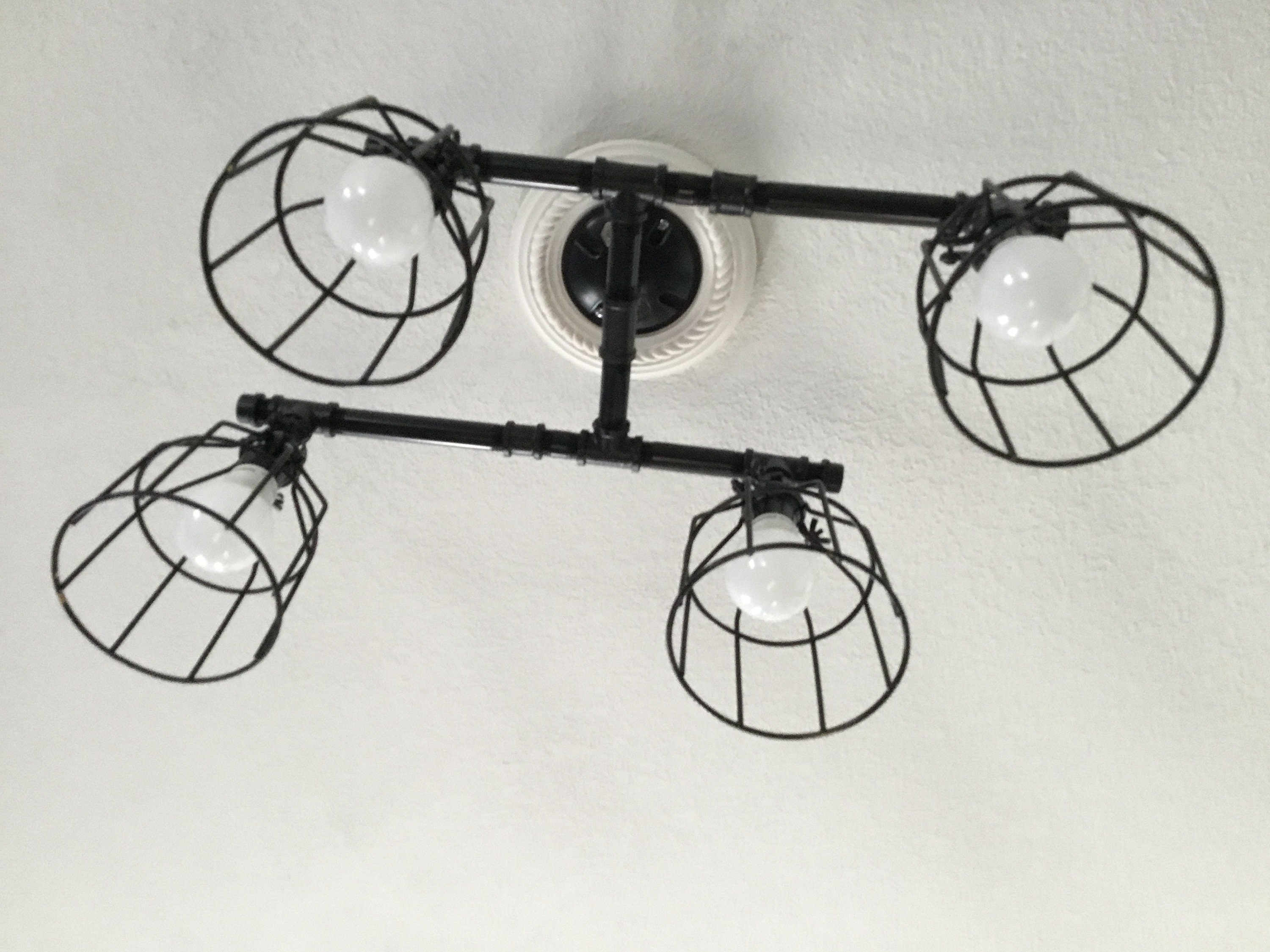 4 Light Black Iron Pipe Metal Light Fixture With Bulb Cages - Etsy