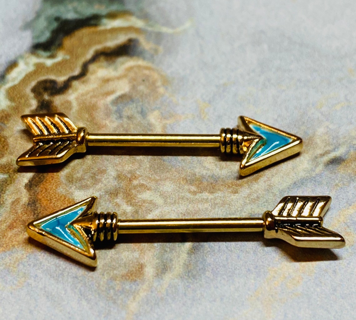 A set of Follow Your Own Arrow Nipple Barbell | Etsy
