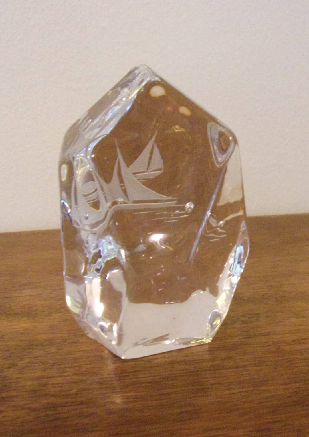 A Heavy Geometric Shaped Clear Glass Paperweight With Etched Yachts ...