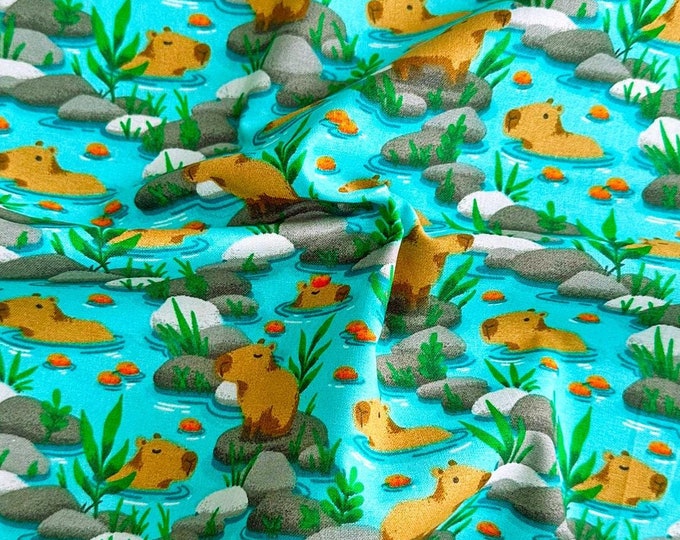 Capybara Springs on Blue 44" Wide 100% Cotton Novelty Fabric - Sold by ...