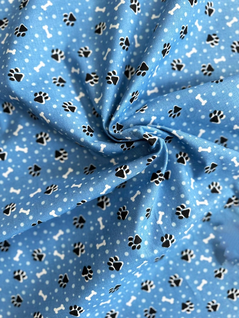 Dog Paw Prints and Bones on Denim Blue 44" Wide 100% Cotton Novelty ...