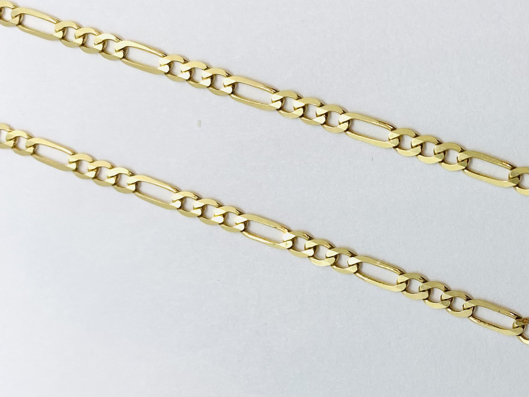14kt gold figaro bracelet store
