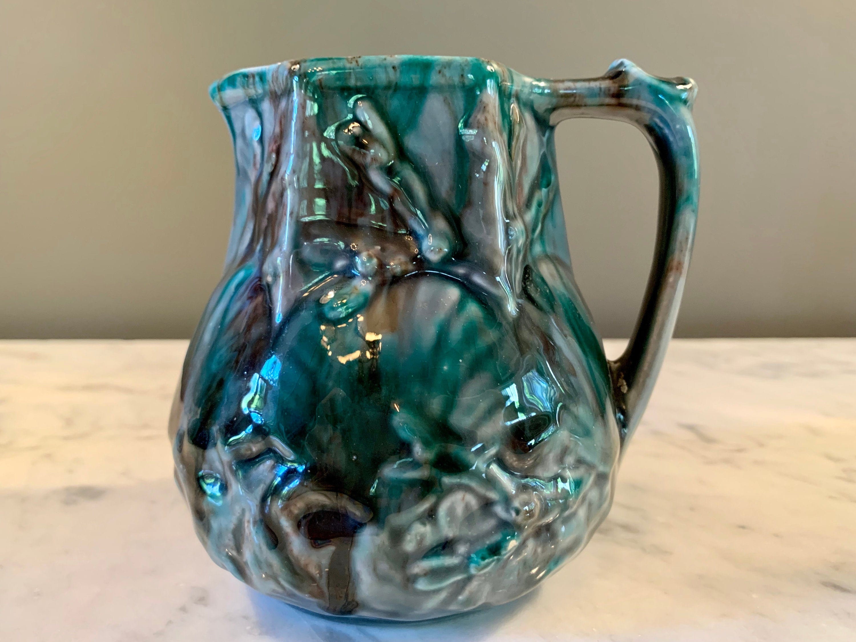 A Colorfully Glazed Art Pottery Pitcher or Creamer With Shell Design ...