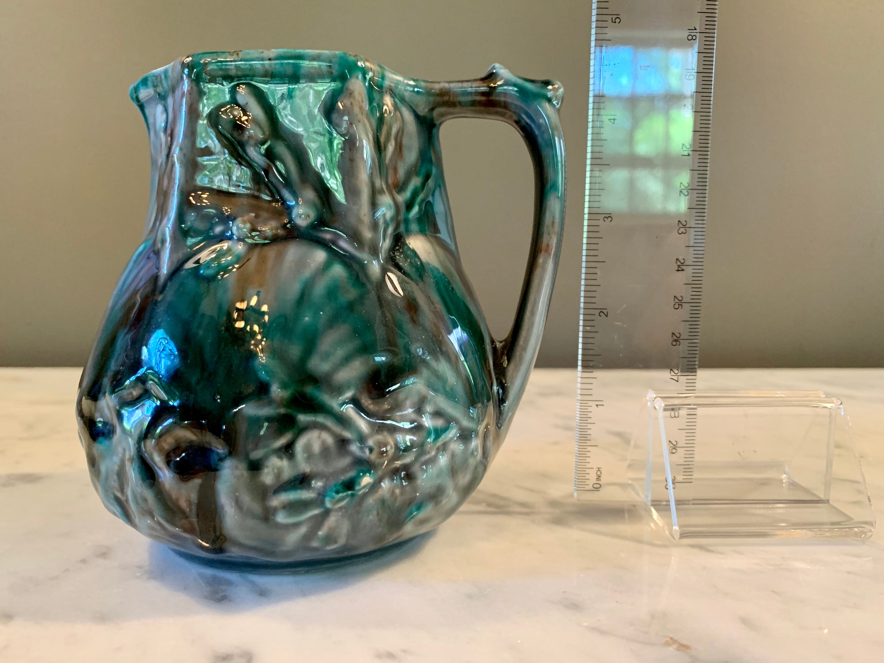 A Colorfully Glazed Art Pottery Pitcher or Creamer With Shell Design ...