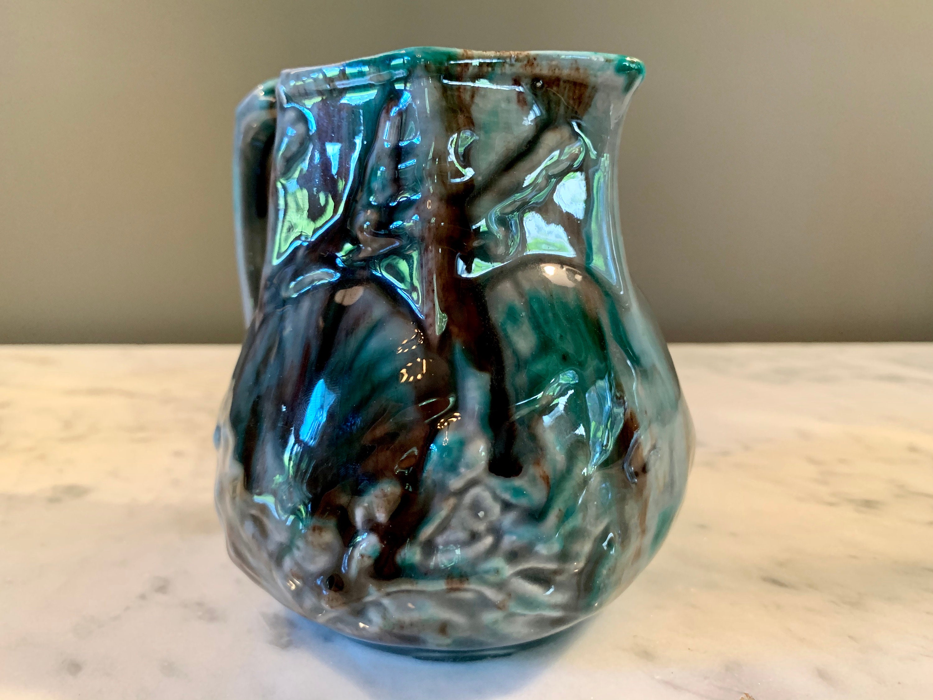 A Colorfully Glazed Art Pottery Pitcher or Creamer With Shell Design ...