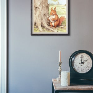 Red Squirrel Reading a Book Next to a Tree Art Print, Softness ...