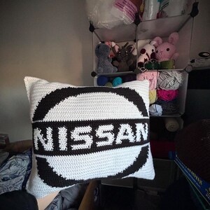 Nissan Logo Crochet Pattern – DIY Pillow and Tapestry | Automotive ...