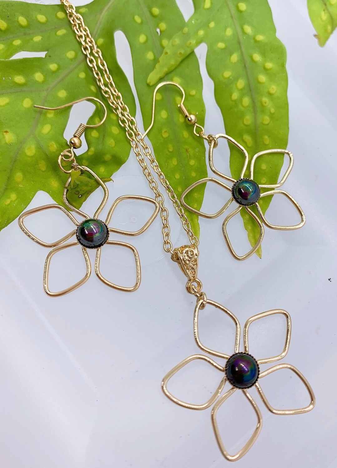 Hawaii Plumeria Flower Peacock Shell Pearls Hamilton Gold Earring and ...