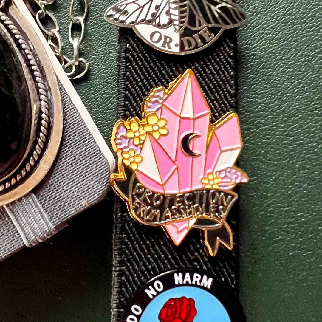 Protection From Assholes Gold Enamel Pin With Pink Crystals And Black