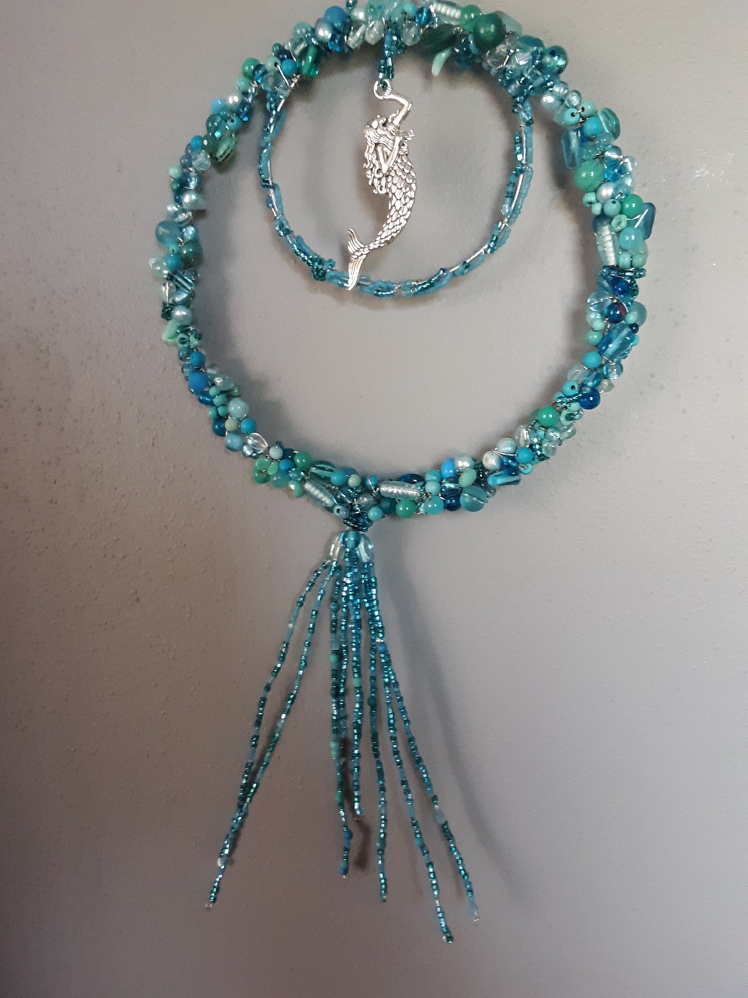 Teal Wall Hanging- Silver Mermaid, Swimming Within a Set of Circles ...