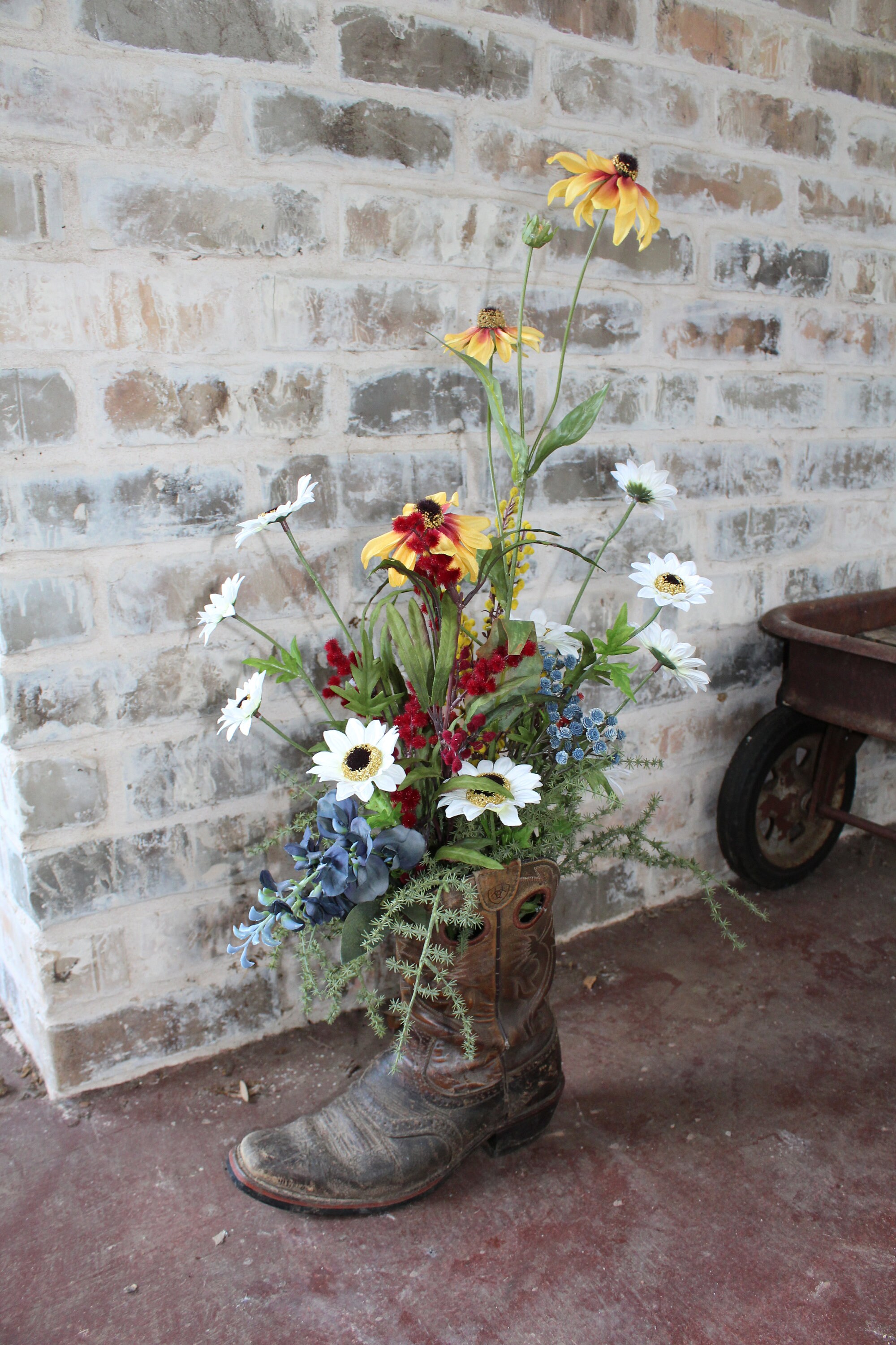 Home Décor Ridden hard Cowboy boots with wild flowers Floral ...