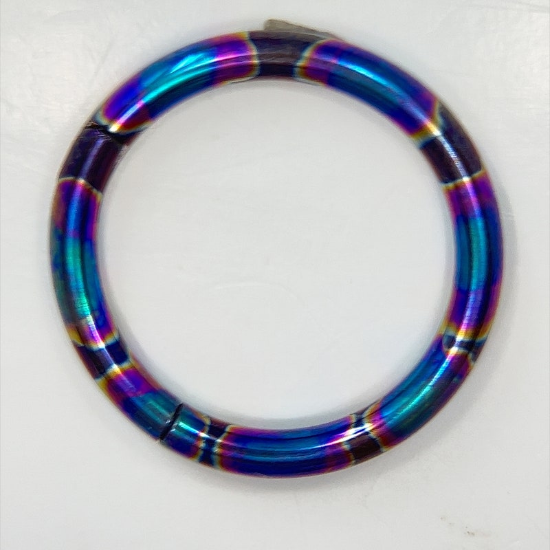 Oil Slick Clickers - Etsy