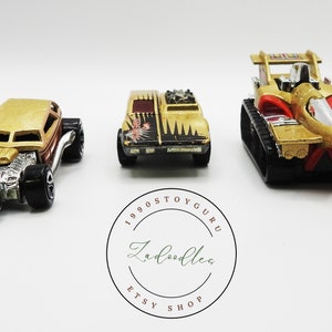Exclusive Golden Hot Wheels Collection - 1992 Treadator, 1970 Side Kick ...