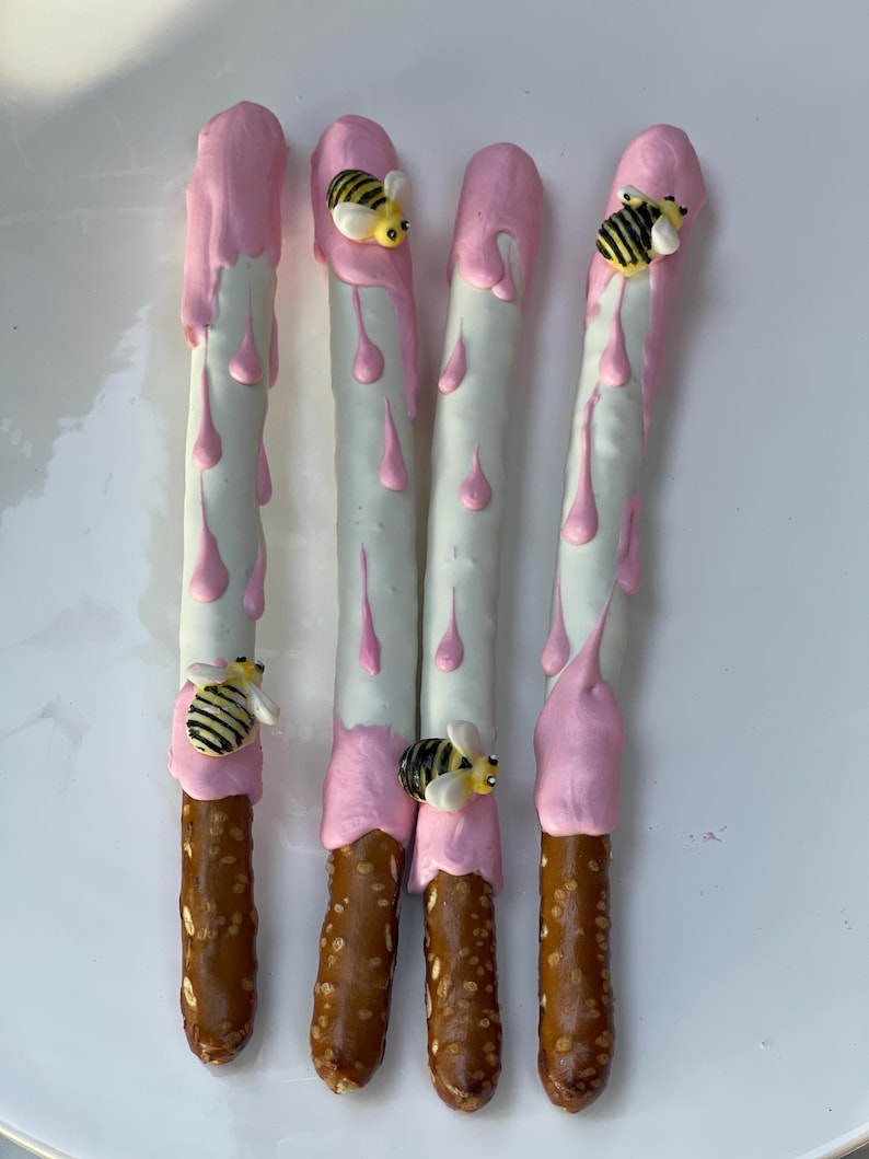 Bumble Bee Chocolate Pretzels – White Chocolate With Pink Honey Drip ...