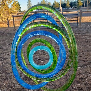 Colorful Spinning Glass Circle Garden Art, Blue & Green Clear Ring ...