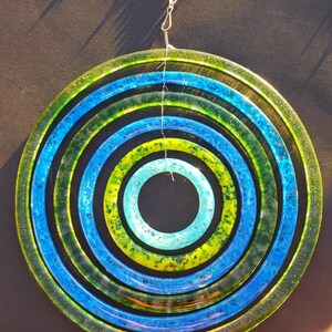 Colorful Spinning Glass Circle Garden Art, Blue & Green Clear Ring ...