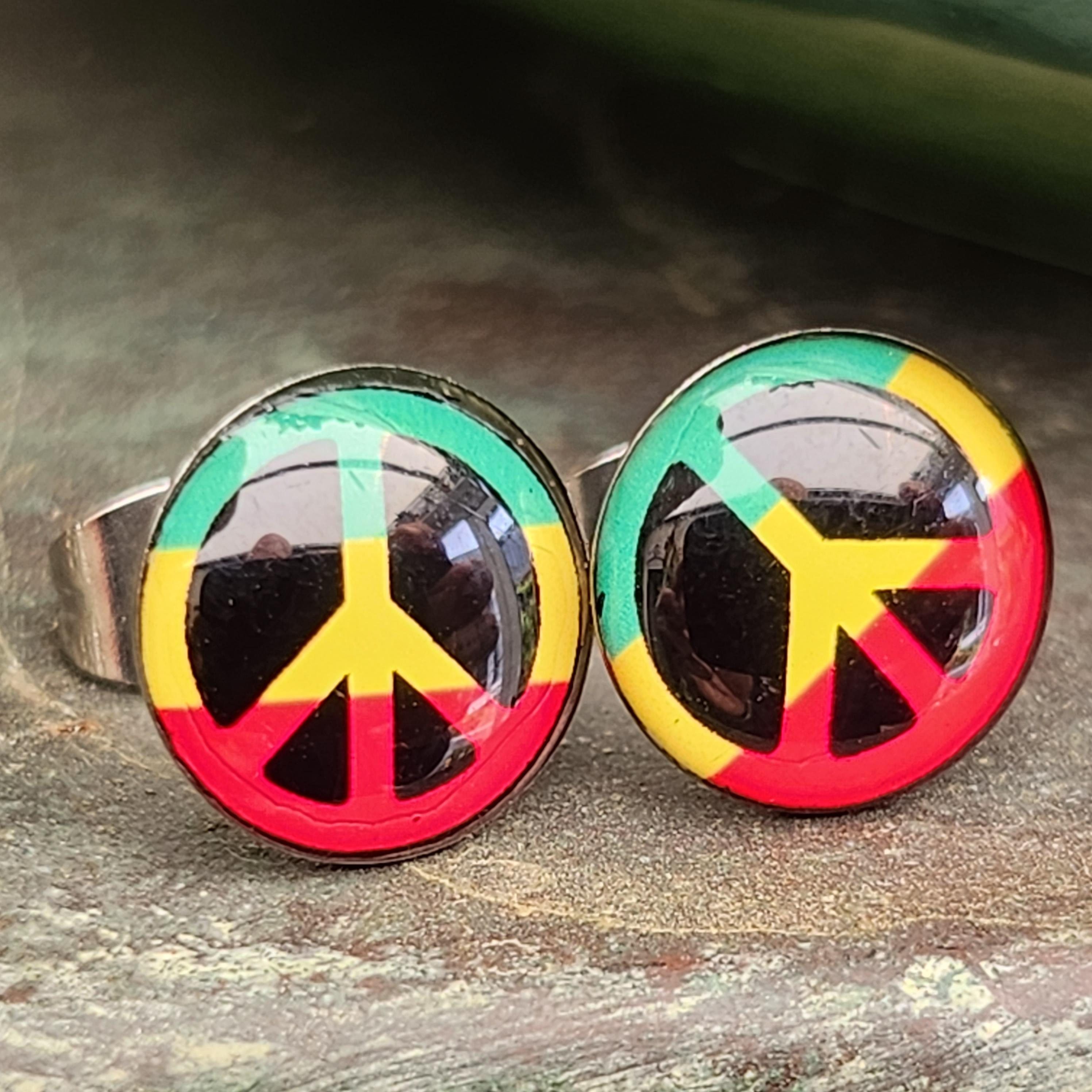 Rasta Colored Peace Sign Tattoos