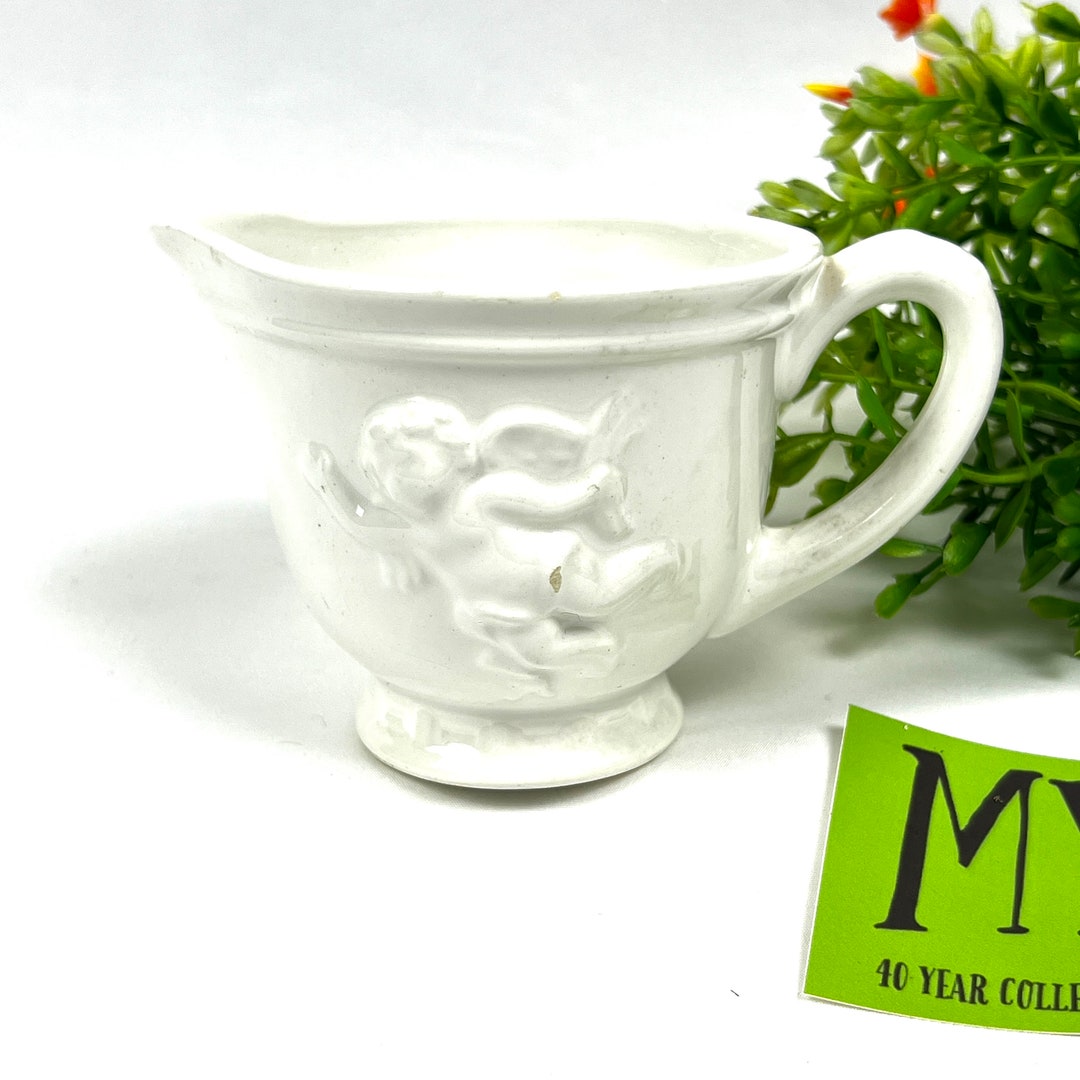 Beautiful Vintage White Porcelain Angel Embossed Cup With Spout ...