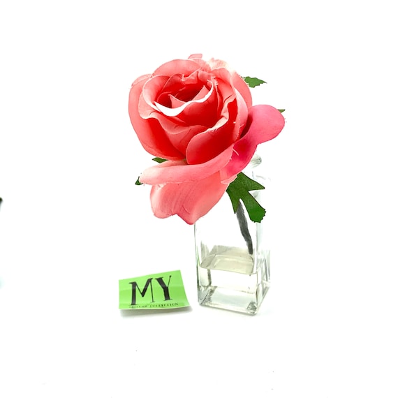 Single Rose In Vase On Table