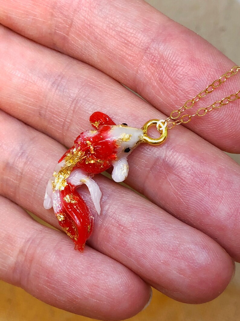 TUI LA Avatar Moon Spirit Inspired White, Red and Gold Flake Koi ...