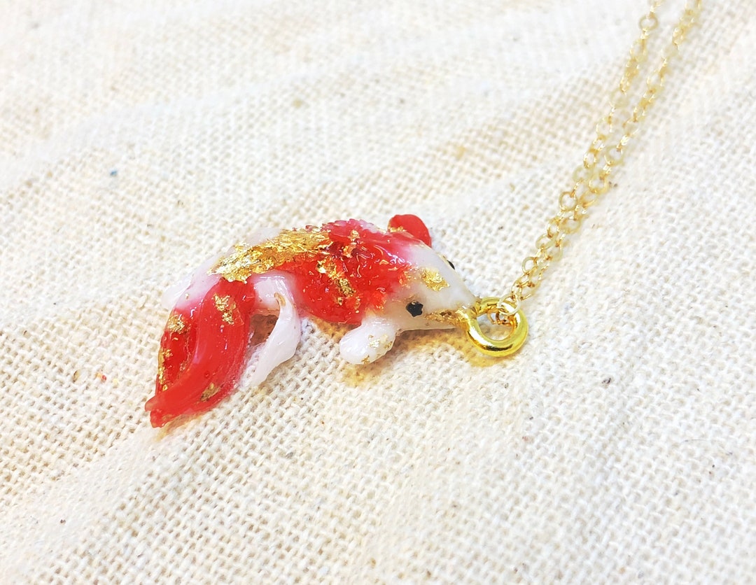 TUI LA Avatar Moon Spirit Inspired White, Red and Gold Flake Koi ...