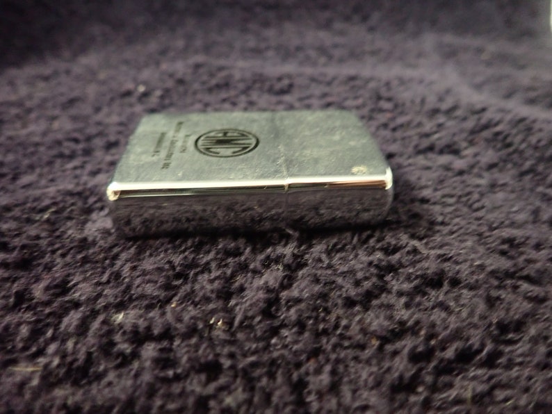 Vintage ZIPPO 16 Hole Advertising Lighter AMC Associated Mechanical ...