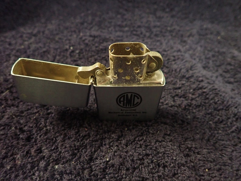 Vintage ZIPPO 16 Hole Advertising Lighter AMC Associated Mechanical ...