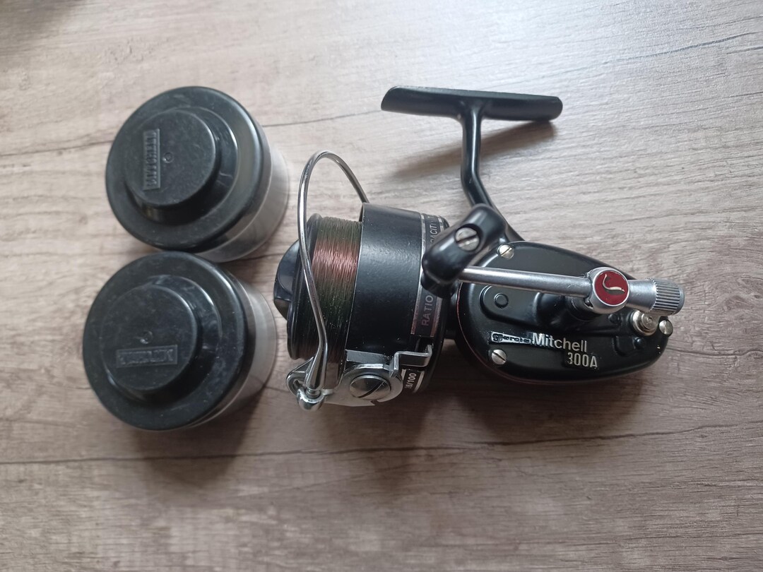 A Beautiful Vintage Mitchell 300A Fixed Spool Fishing Reel With Two ...