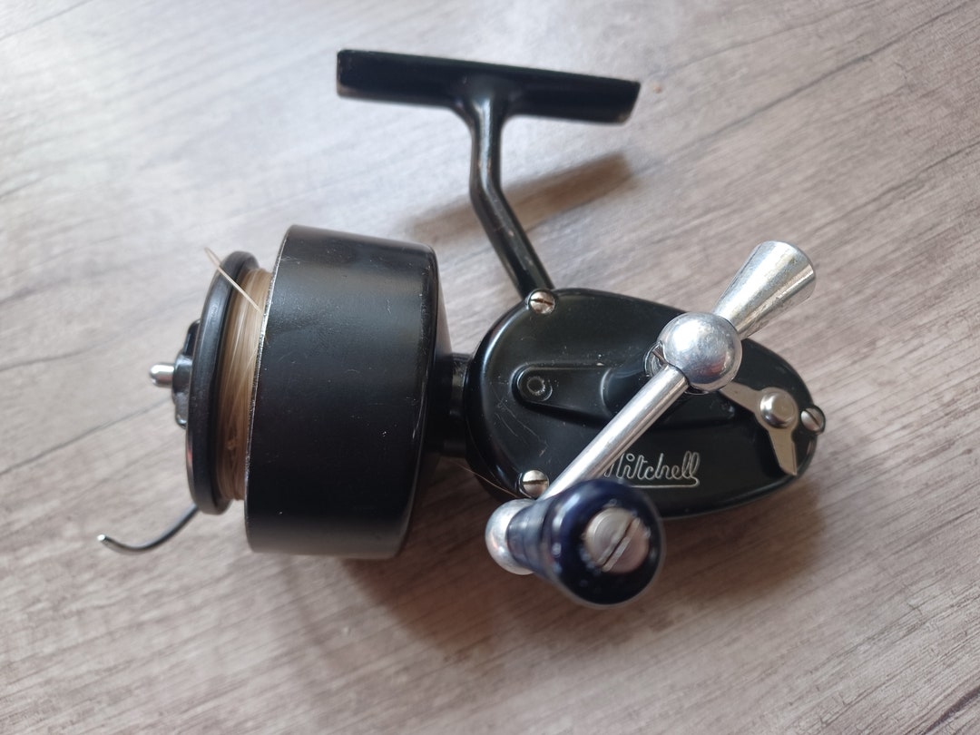 An Early Half Bale Arm Mitchell 300 Shape Version Three Spinning Reel ...