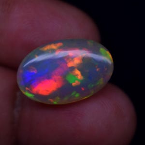 Top Quaility Galaxy Fire Ethiopian Opal Oval Shape 8.10 Carat Ethiopian Opal Cabochon Gemstone ...