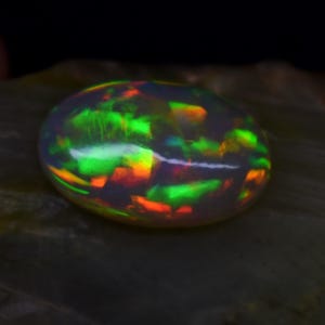 Top Quaility Galaxy Fire Ethiopian Opal Oval Shape 8.10 Carat Ethiopian Opal Cabochon Gemstone ...