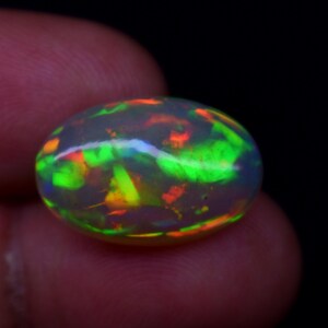 Top Quaility Galaxy Fire Ethiopian Opal Oval Shape 8.10 Carat Ethiopian Opal Cabochon Gemstone ...