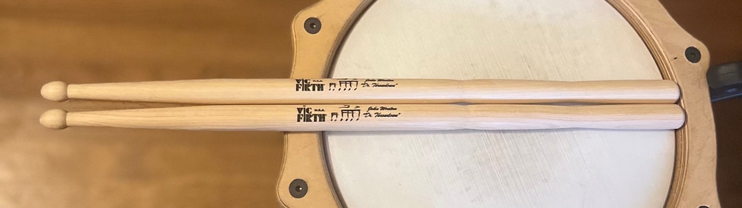 The Throwdowner Marching Percussion Drum Stick Designed by John Wooton ...