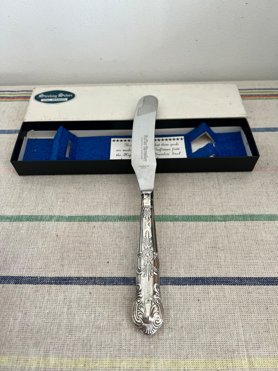 An Immaculate Boxed Sterling Silver Butter Spreader With a Stainless ...