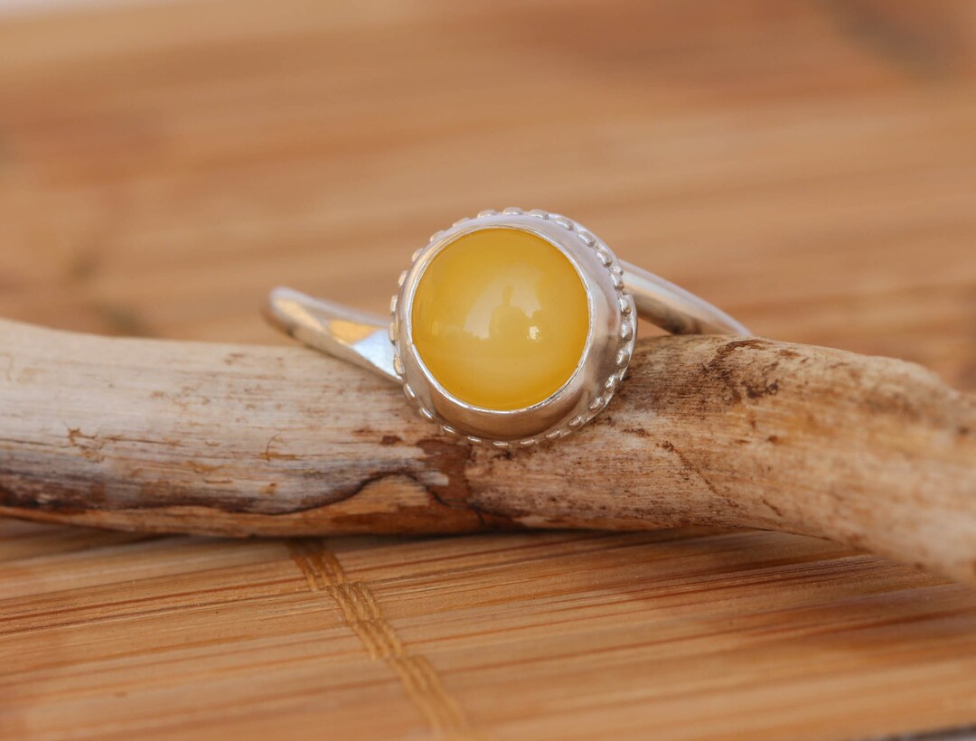 Vintage-inspired Butterscotch Amber Set on Twisted Silver Ring ...