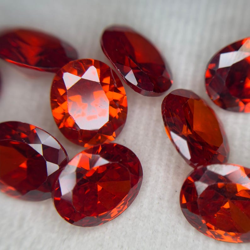 100 Pcs Red Zircon Gemstone Oval Faceted Loose Ston Faceted Cubic ...