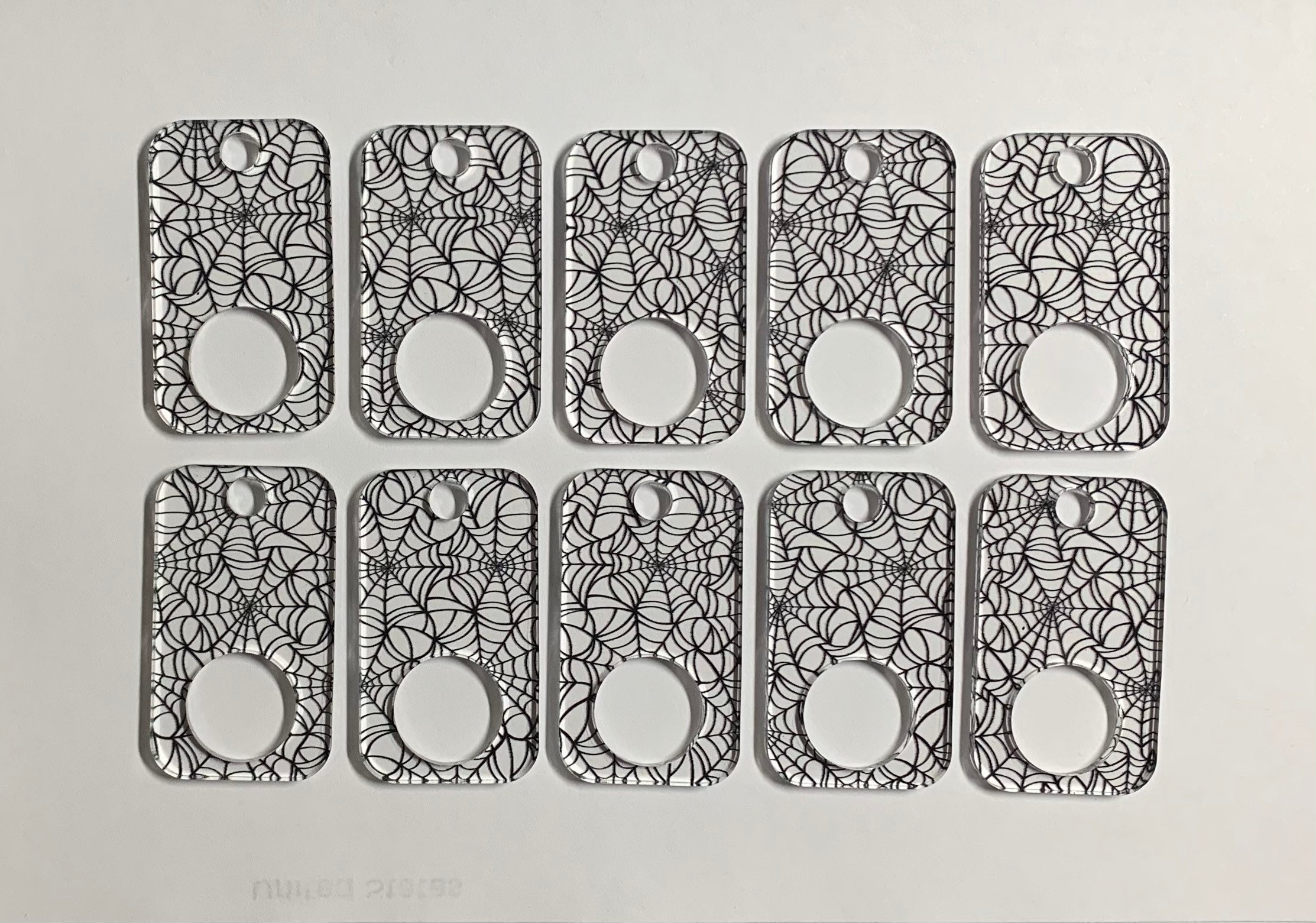 Limited Edition Rectangular Spider Webs Acrylic Thread Drops. A Crossed ...