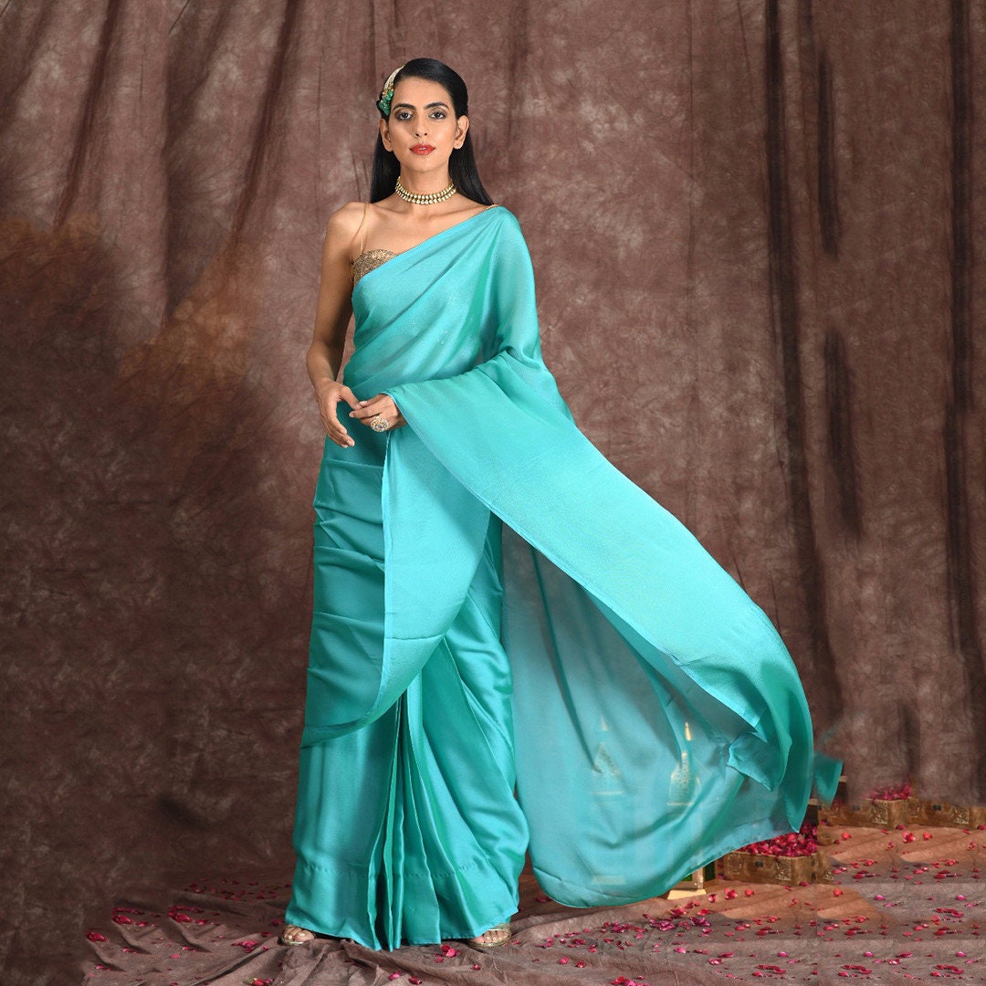 Sky Blue Satin Silk Plain Saree With Gold Sequence Embroidery Unstitch