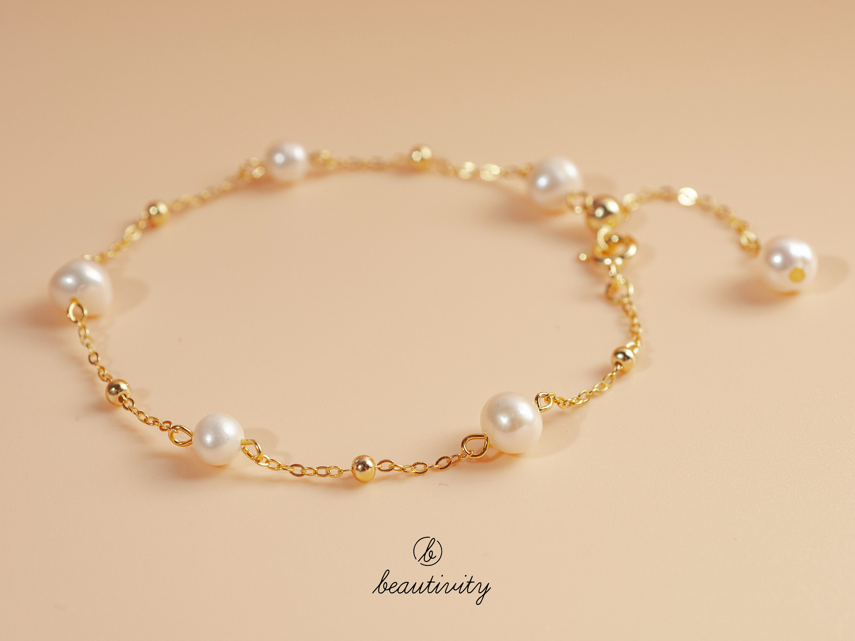 Silver and pearl bracelet store