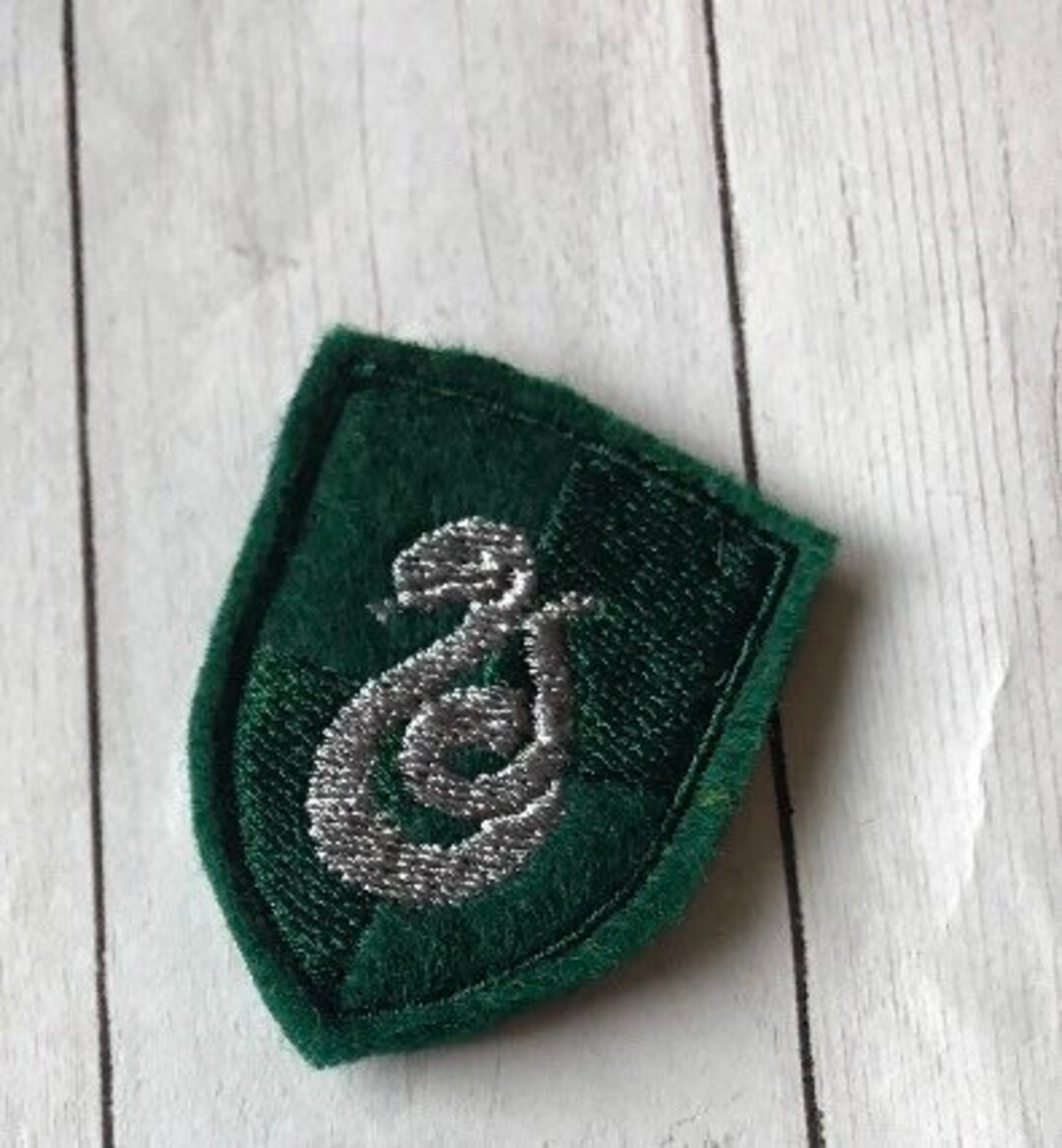 Snake Crest Badge Reel - Etsy