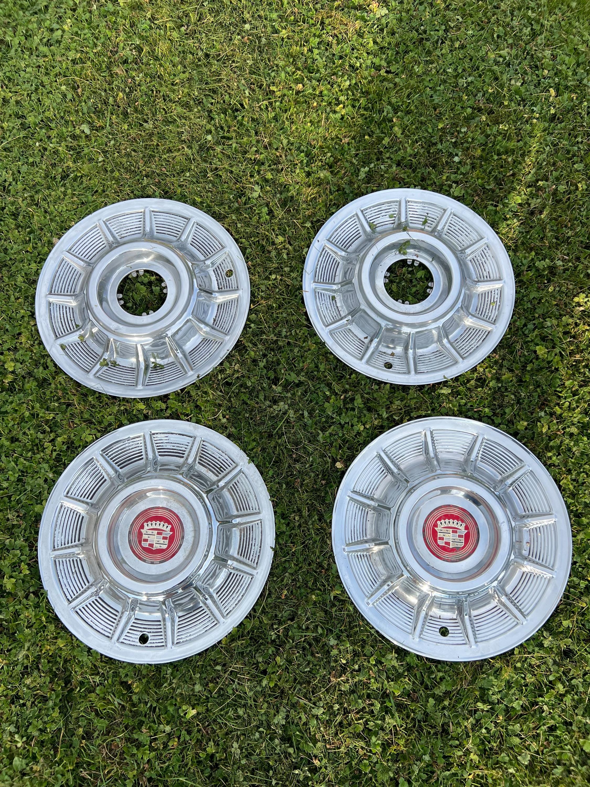 57 cadillac hubcaps store