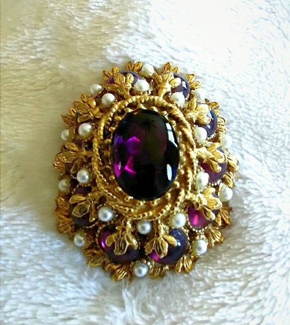 Regal brooch layered with purple cabachons & faux pea… - Gem