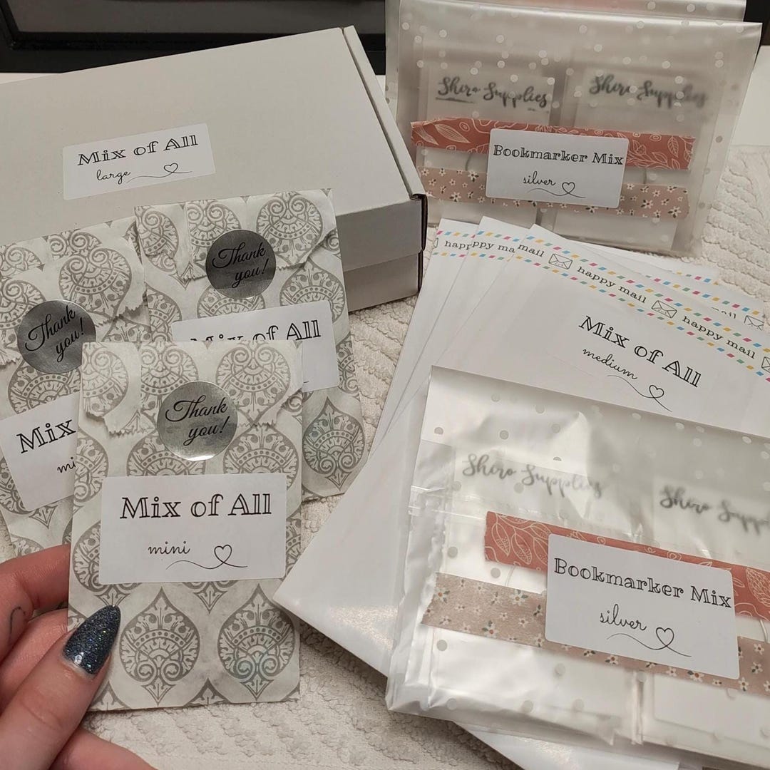 Mystery Goodie Bag! Including; Phone Charms, Keychains, Dust Plugs ...
