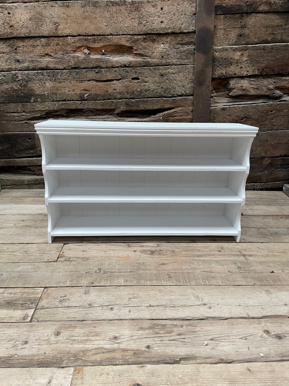 Side table with shoe storage store