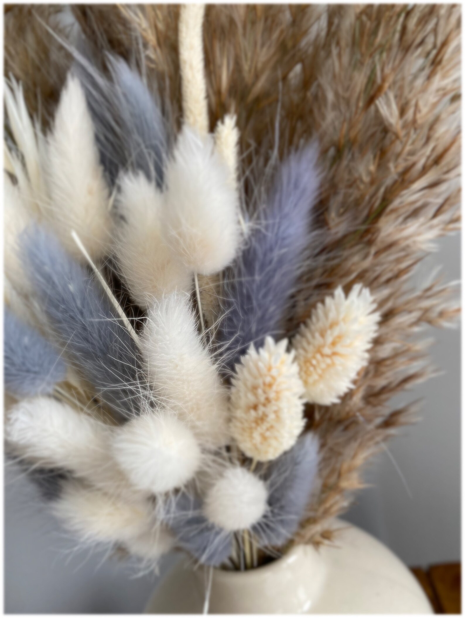 A Delicate Grey and Bleached White Dried Flower Arrangement With Pampas ...