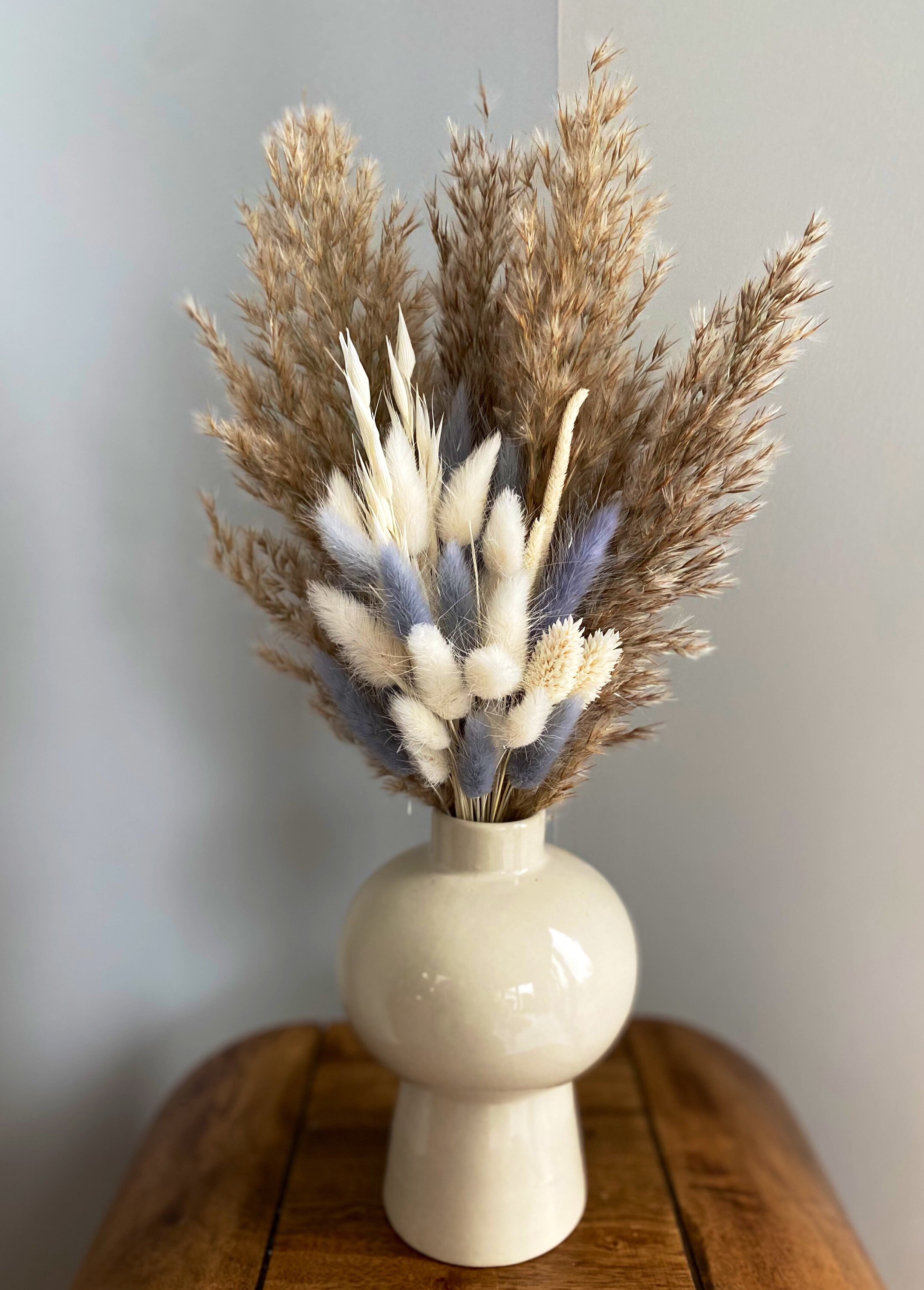 A Delicate Grey and Bleached White Dried Flower Arrangement With Pampas ...